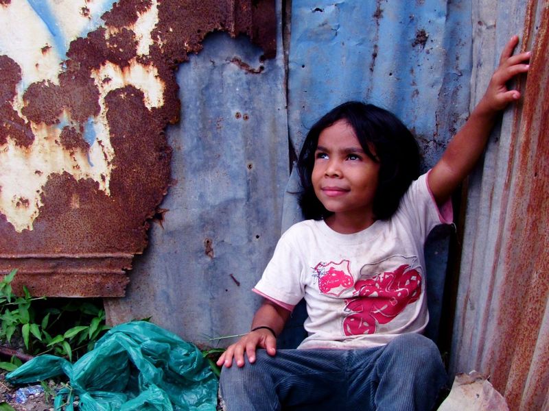 In La Carpio, the slum of San Jos, Costa Rica, a child poses in what he ...
