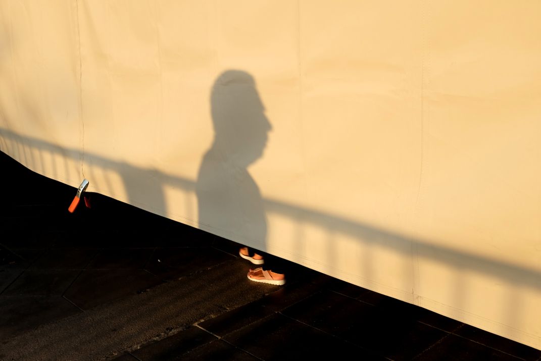 Walking shadow. | Smithsonian Photo Contest | Smithsonian Magazine