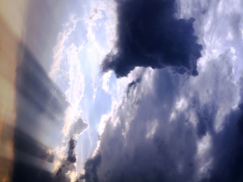 The sun shinning through the clouds after a rainstorm. | Smithsonian ...