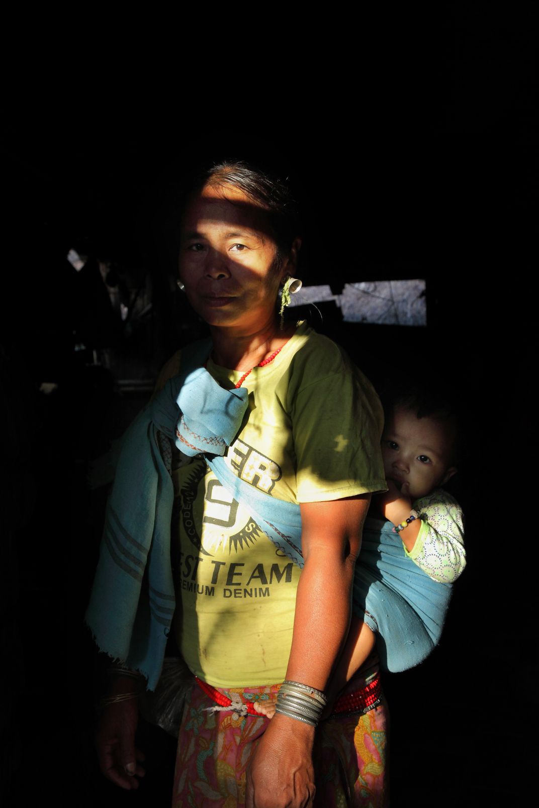 An indigenous Mro tribal woman and granddaughter | Smithsonian Photo ...