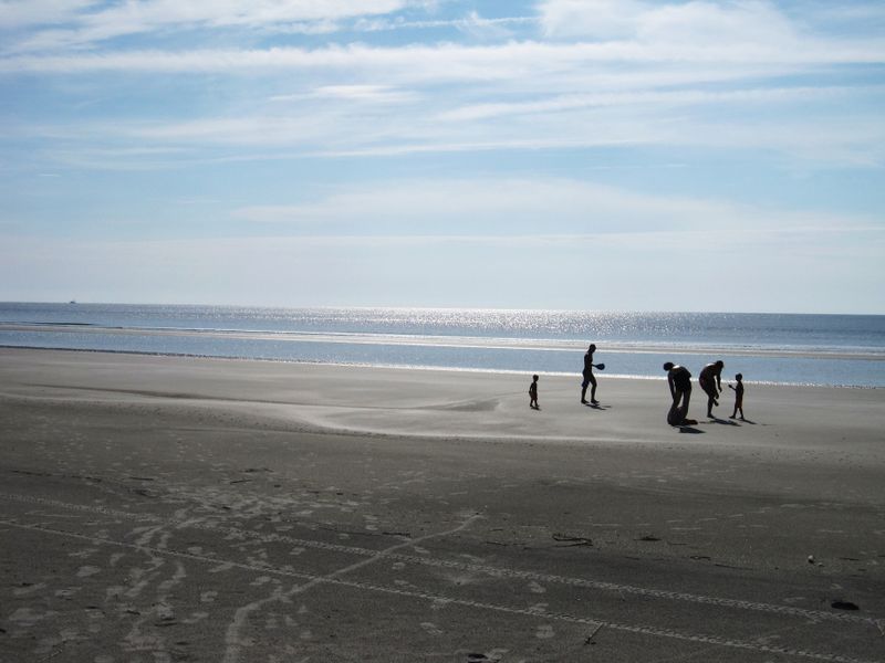 Family playing on the beach of Sapelo Island. | Smithsonian Photo ...