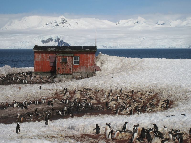This is an old red research building in Antarctica. I has been unused ...