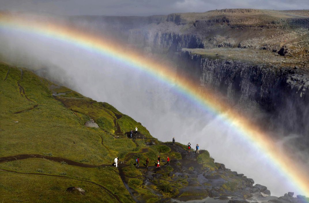 A rainbow forms over waterfalls in Iceland | Smithsonian Photo Contest ...