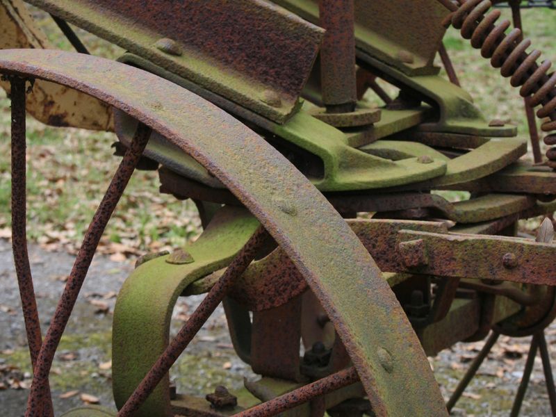 Rustic farm equipment on an old plantation site used now only for ...