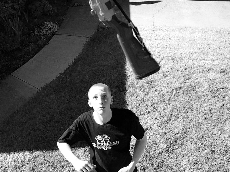 Wesley Newman performing "The Triple" during a rifle drill practice ...