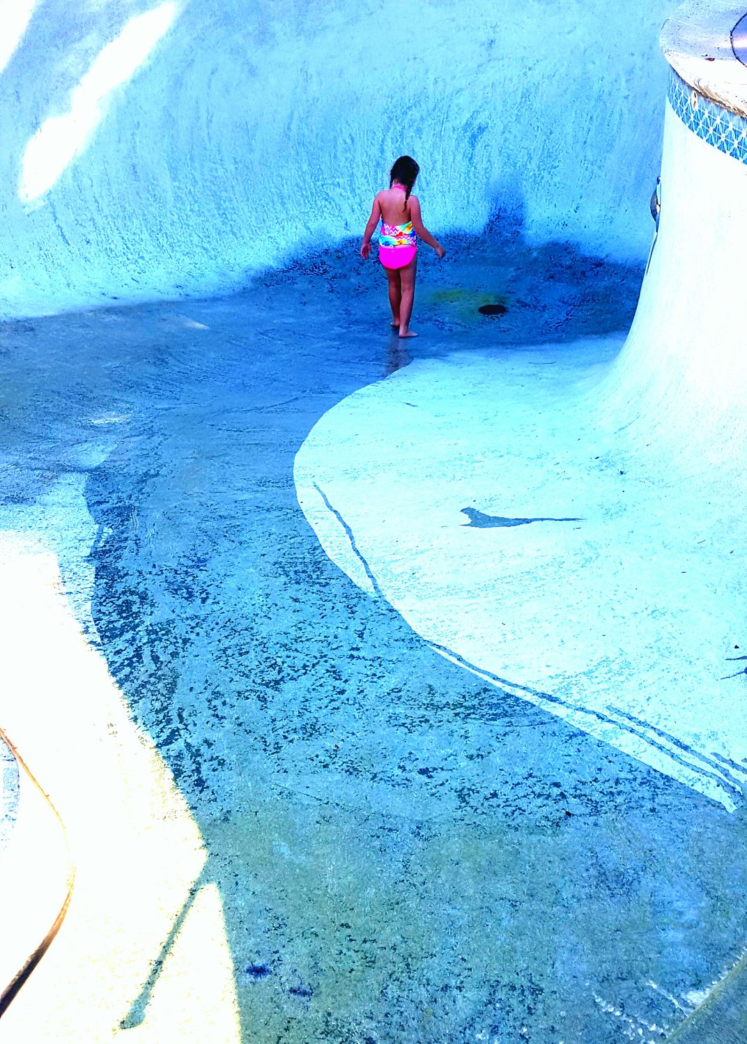 Young girl playing in empty pool | Smithsonian Photo Contest ...