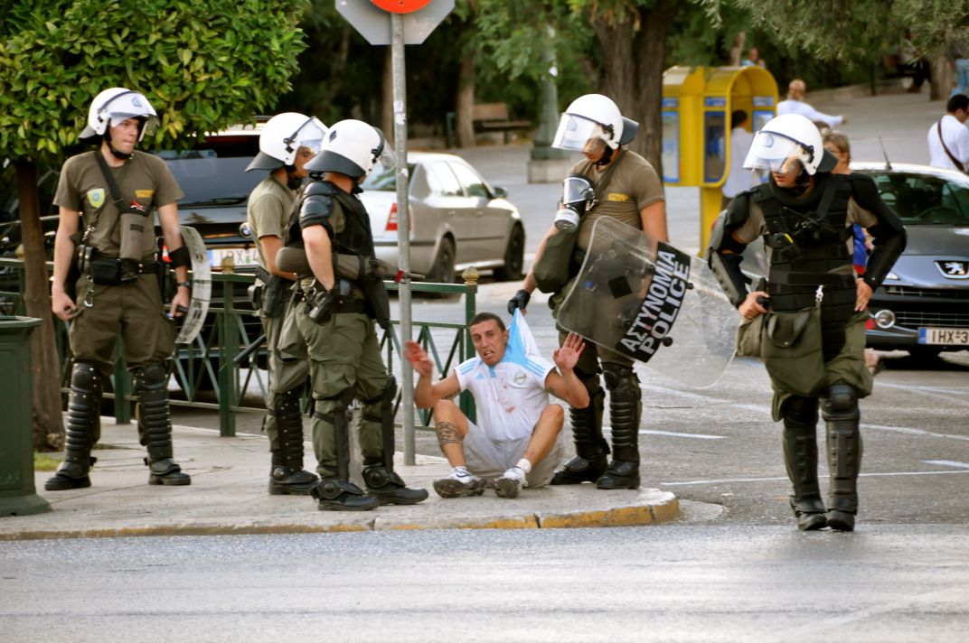 Protestor detained after getting violent at a Greek Riot | Smithsonian ...