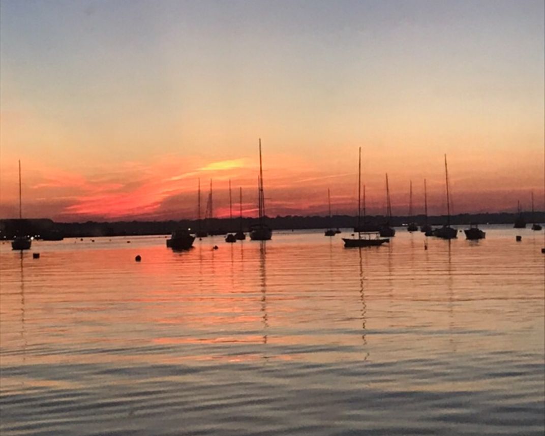 Incredible sunset and sailboats by the bay at New Port, Rhode Island ...
