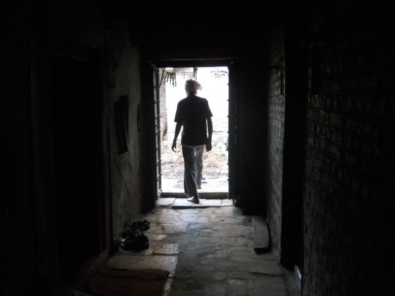 Man walking through door. camera: COOLPIX L24 | Smithsonian Photo ...