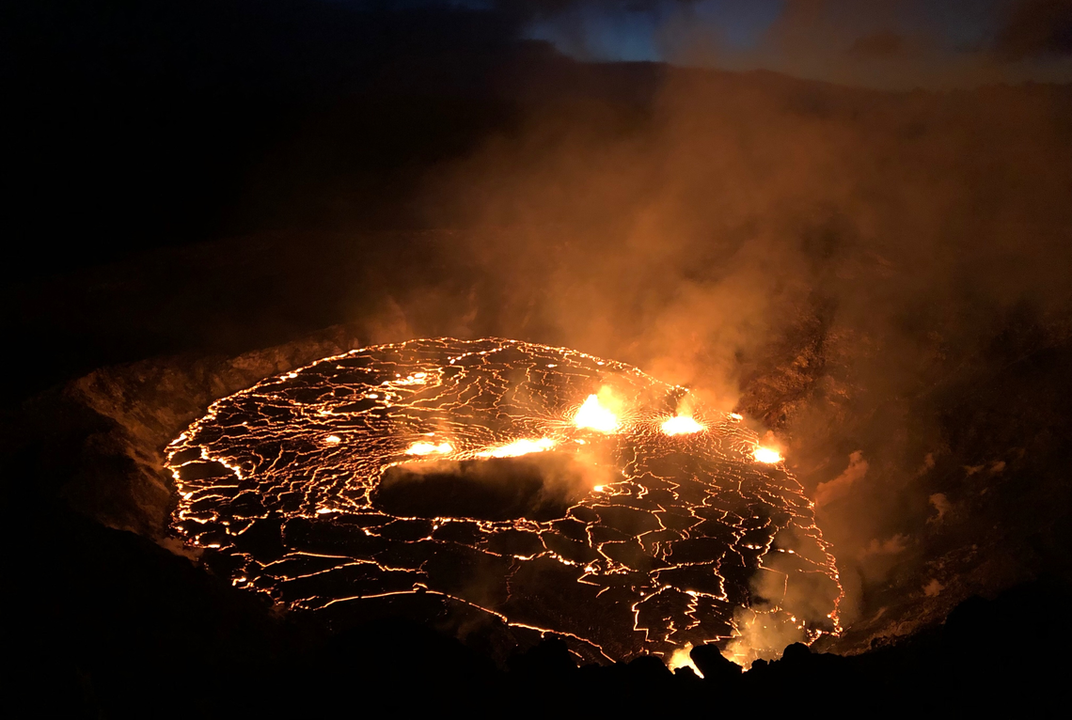 volcano explosion at night