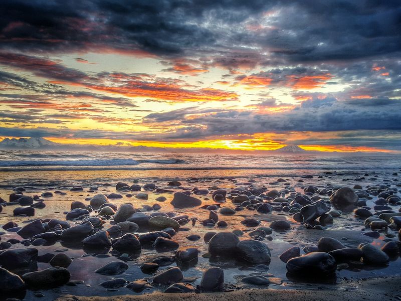 Sunset over Cook Inlet with Pacific Volcanoes. Anchor Point, Alaska ...