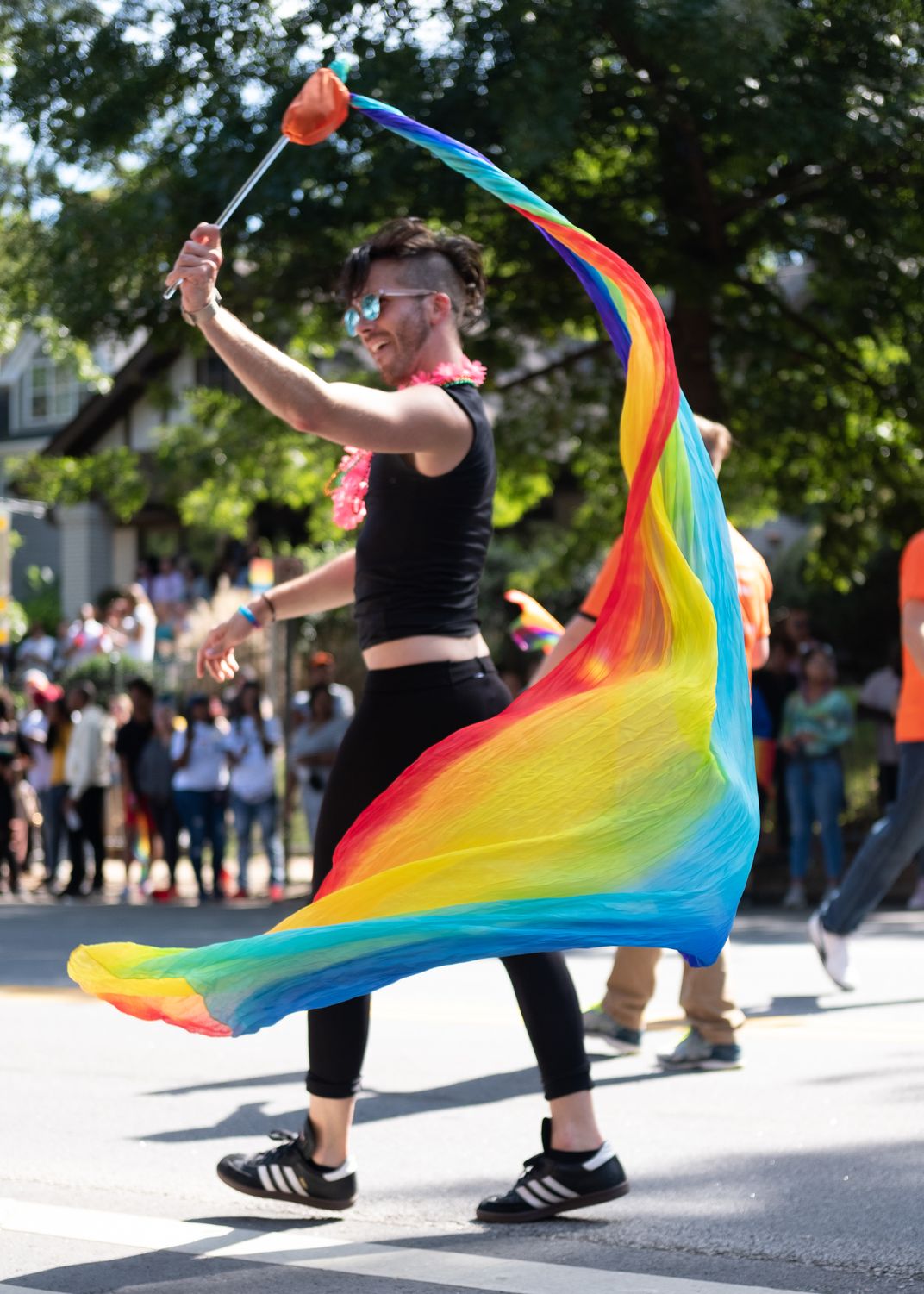 Flow artist marches during Atlanta pride parade. | Smithsonian Photo ...