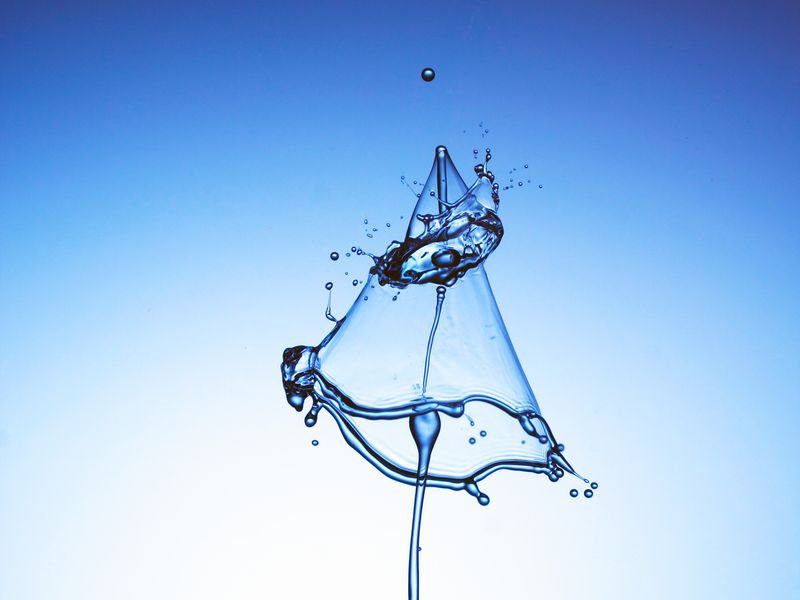 High speed photograph of two water drops colliding. | Smithsonian Photo ...