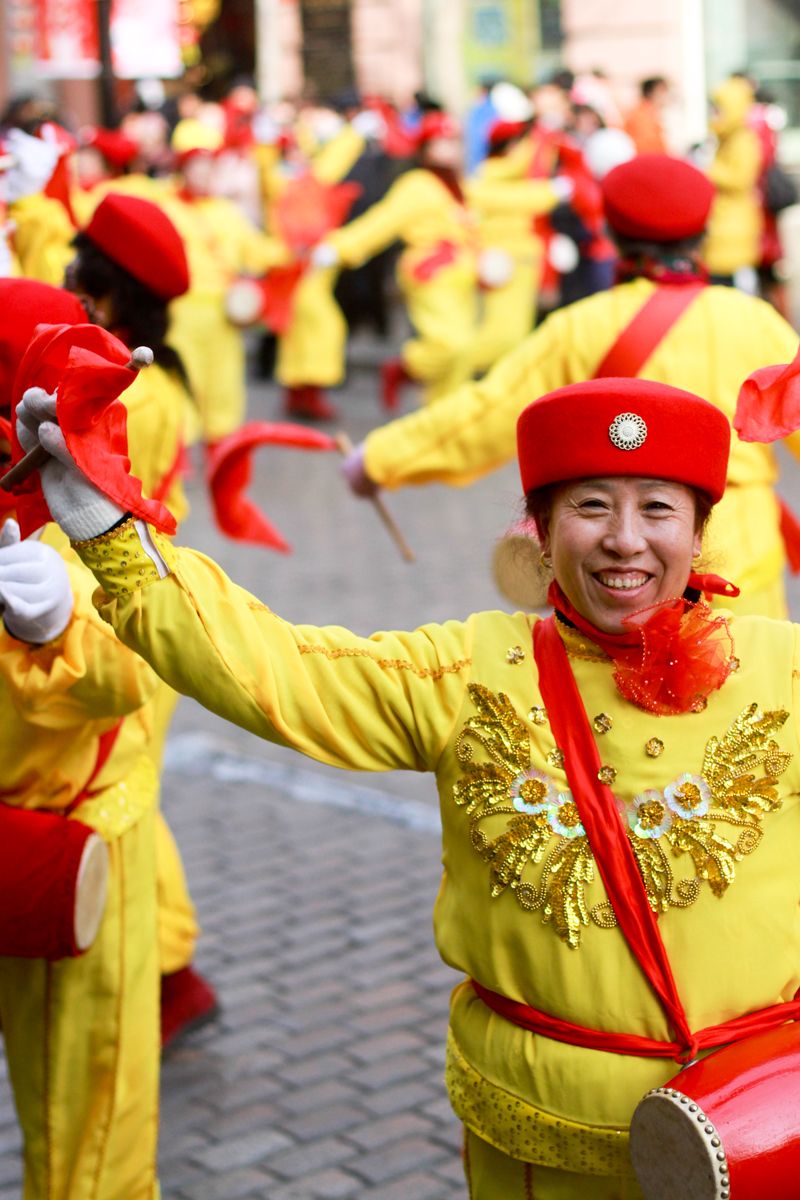 A woman performs a traditional dance in Harbin, northern China ...