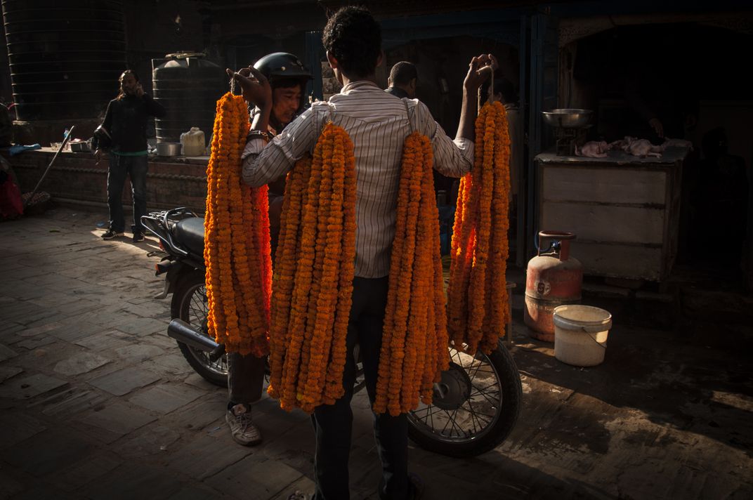 marigold seller | Smithsonian Photo Contest | Smithsonian Magazine