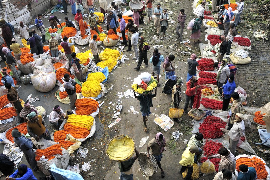 FLOWER MARKET Flower Venders are selling flower to the people in a ...