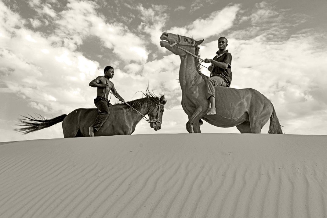 Driving to Bokspits with my family when we came across these goat herd ...