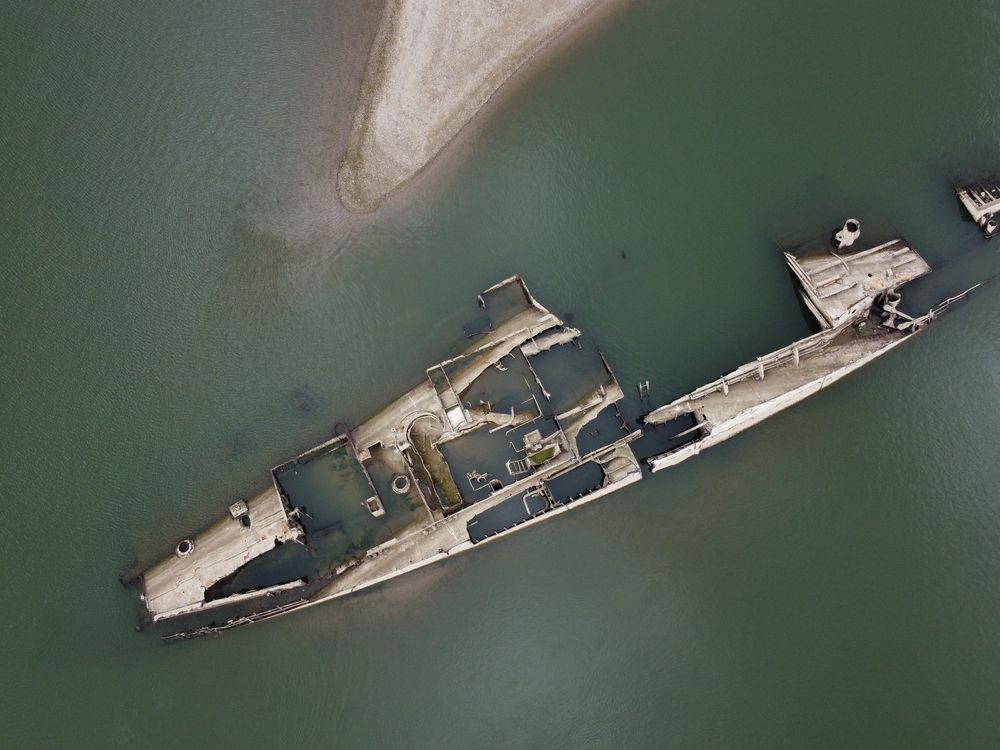 Low Water Levels Reveal Sunken Nazi Ships Full of Unexploded Munitions ...