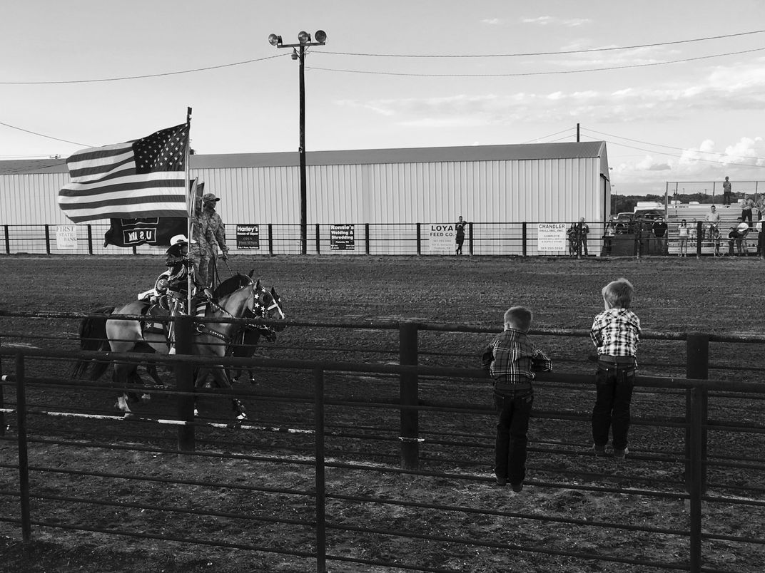 Children at rodeo gaze at flag | Smithsonian Photo Contest ...