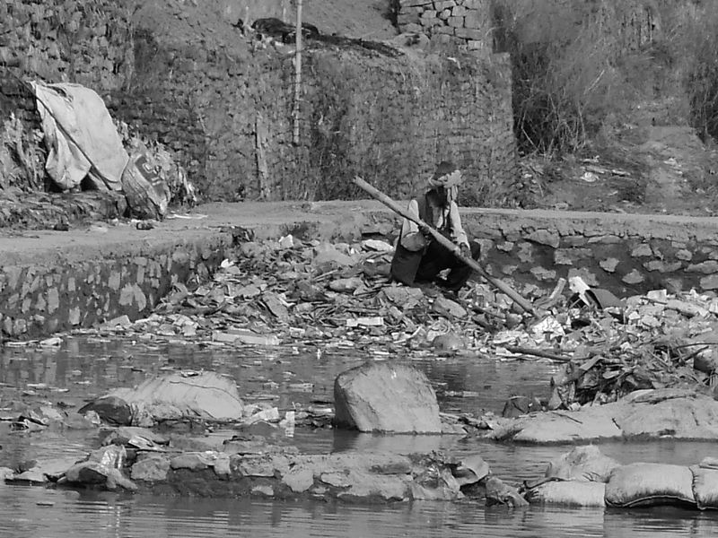 MAN CLEANING RIVER | Smithsonian Photo Contest | Smithsonian Magazine