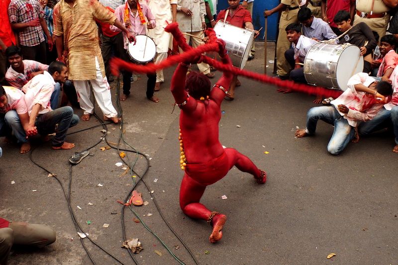A Potharaju, protector of Goddess Mahakali, wields a whip ...