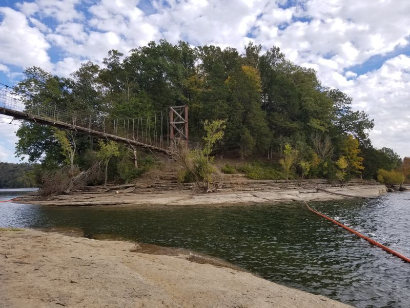 The swing bridge crossing the Dale Hollow Dam | Smithsonian Photo ...