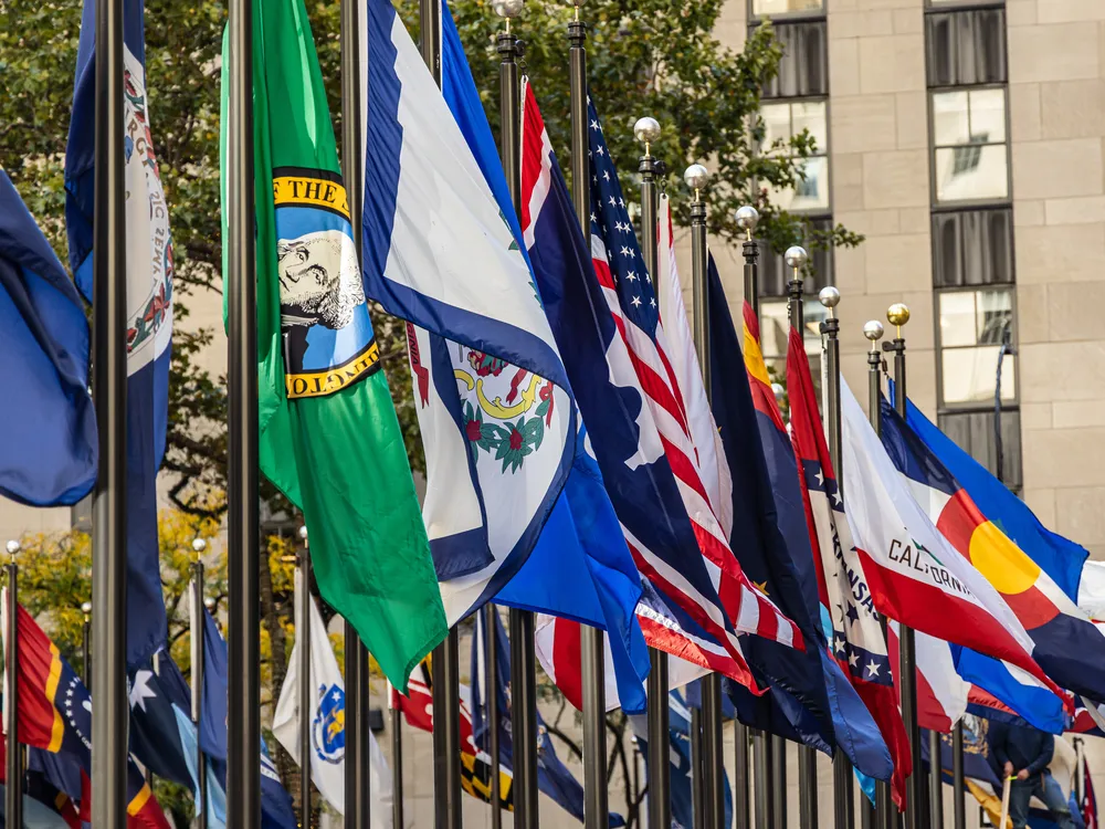 "A Place of - Together We Stand" flags at Rockefeller Sq | Smithsonian ...