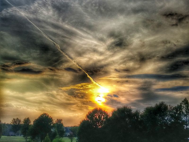 Contrails, clouds and sunset | Smithsonian Photo Contest | Smithsonian ...