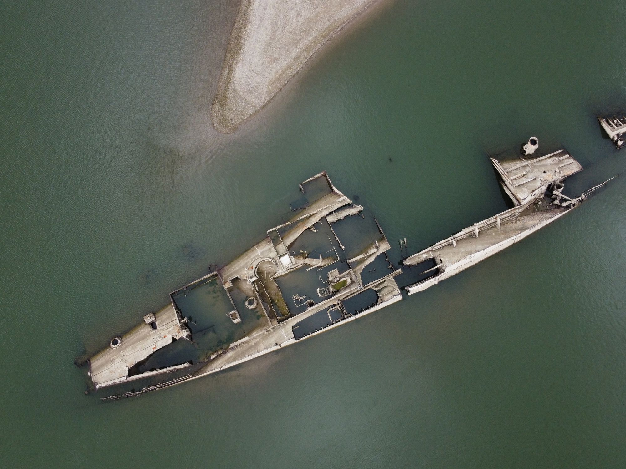 Low Water Levels Reveal Sunken Nazi Ships Full of Unexploded Munitions ...