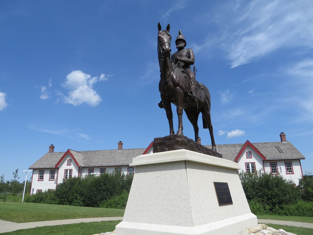 A Royal Canadian Mounted Police statue seems to guard the Fort Calgary ...