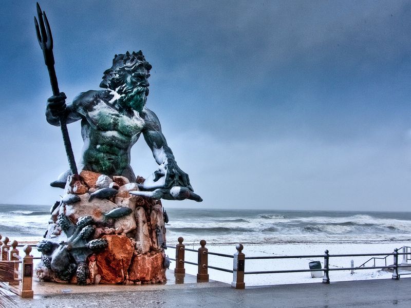 King Neptune looks over a snow scape in Virginia Beach, VA ...