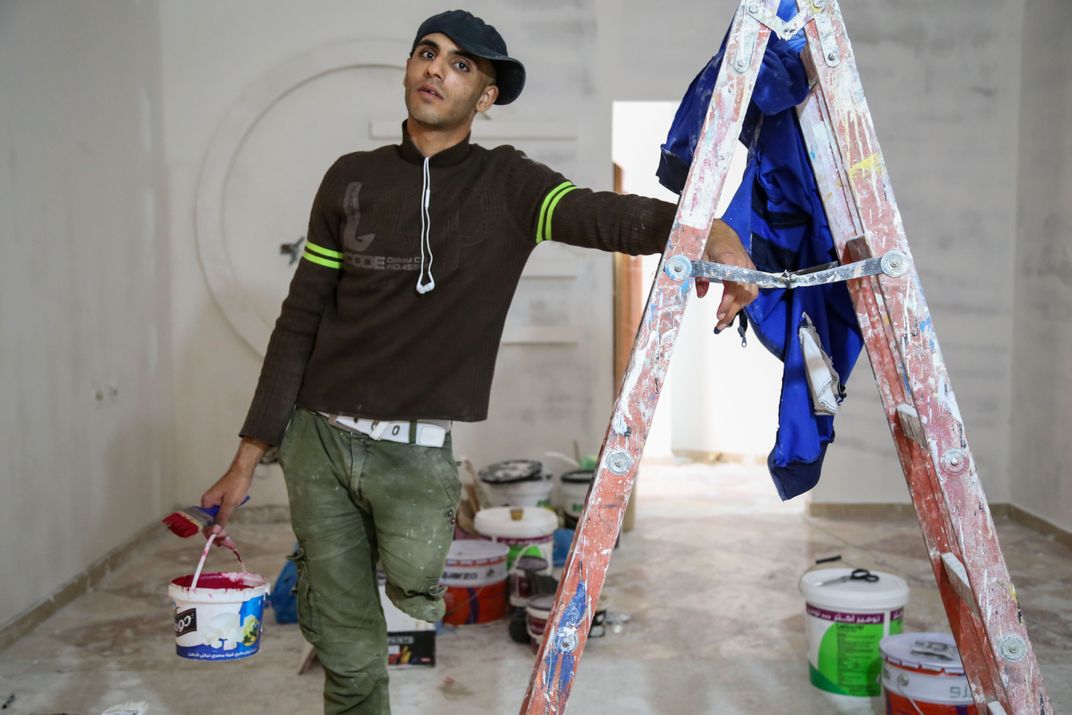 A worker with obstruction | Smithsonian Photo Contest | Smithsonian ...