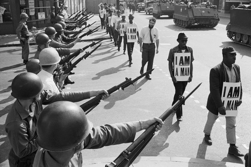 angry black kid at table