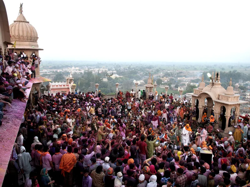 Devotees gather at courtyard of Radha-Rani temple in Barsana, India to ...