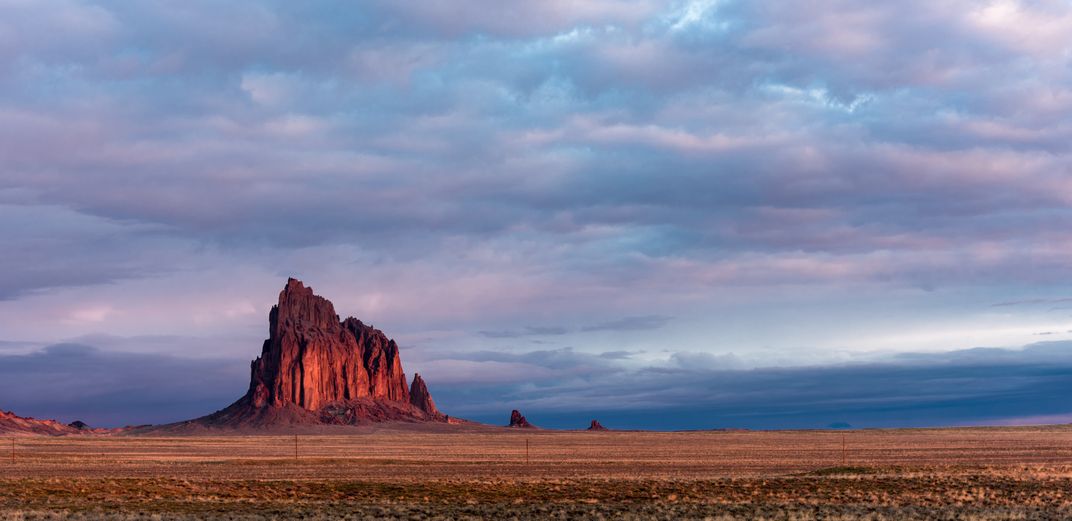 Shiprock at sunrise. | Smithsonian Photo Contest | Smithsonian Magazine