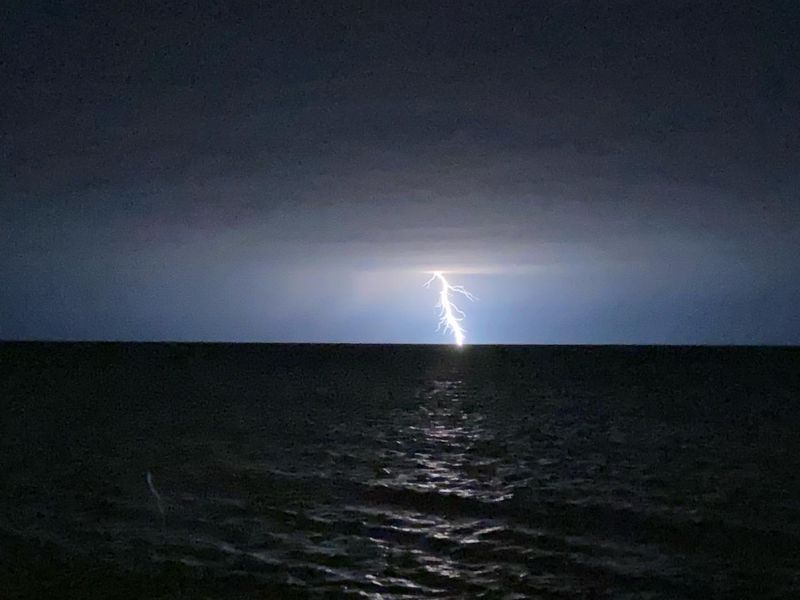 lightning over the sea | Smithsonian Photo Contest | Smithsonian Magazine