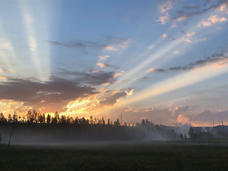 Yellowstone Sunrise with Old Faithful Eruption | Smithsonian Photo ...
