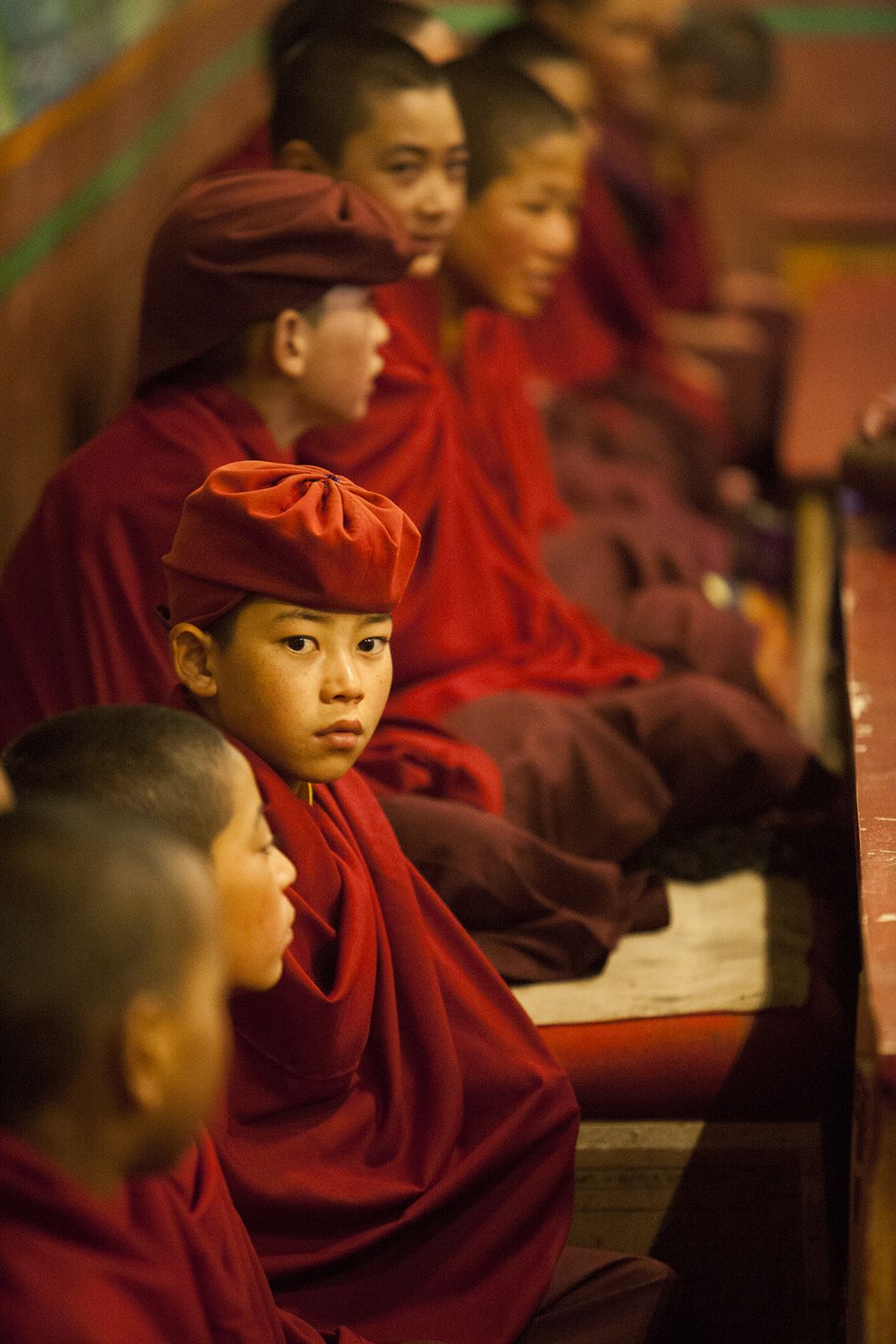 Boy monks gather for prayer in the Hemis Monastery, the wealthiest ...