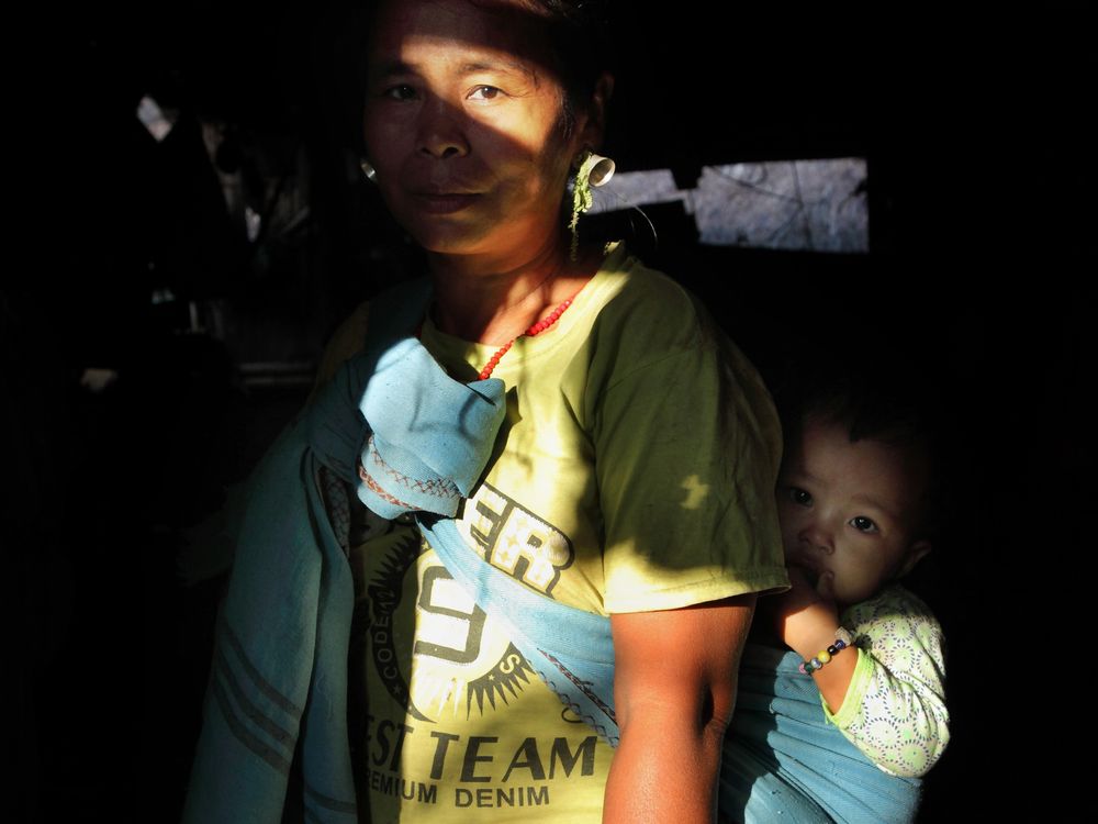 An indigenous Mro tribal woman and granddaughter | Smithsonian Photo ...