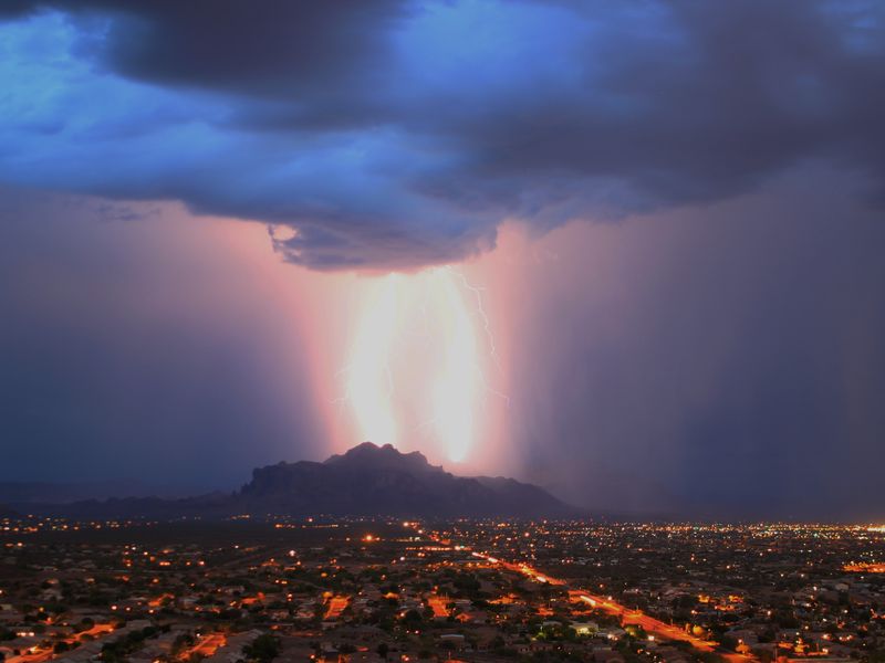 a huge double bolt of lightning strikes Thunder Mountain in Apache ...