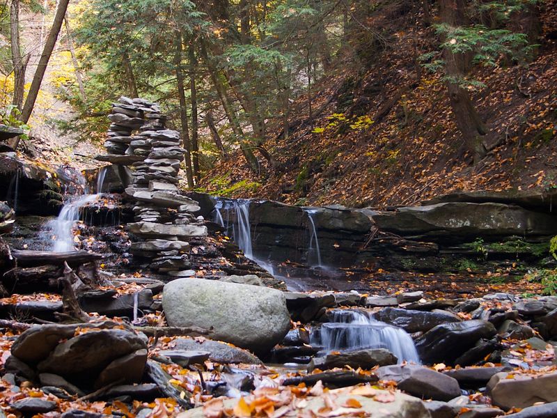 Waterfall with stone sculpture | Smithsonian Photo Contest ...