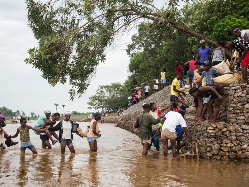 Haitians crossing the Massacre River into Dajabon | Smithsonian Photo ...