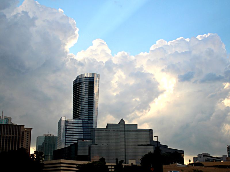 Large cumulus clouds hanging over the middle of Atlanta, Georgia ...