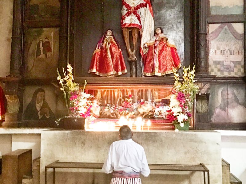 A Mayan Catholic man praying on Lake Atitlan | Smithsonian Photo ...