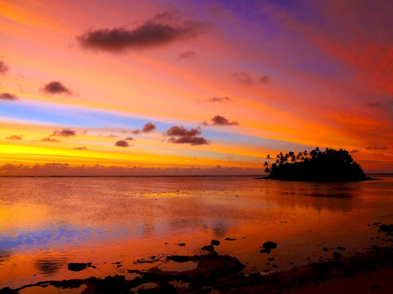 Painted skies at sunrise in Rarotonga, Cook Islands | Smithsonian Photo ...