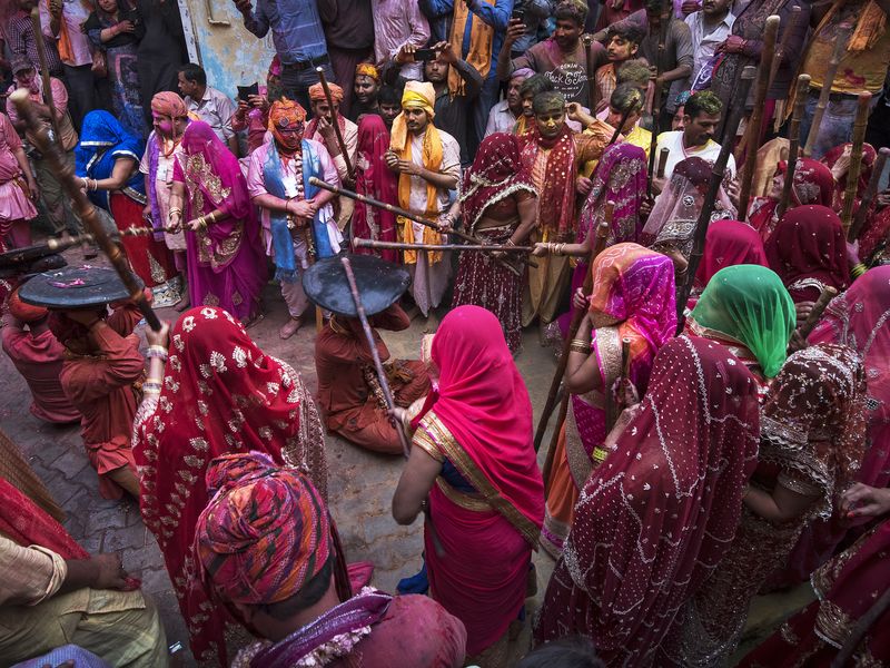 women beating with sticks | Smithsonian Photo Contest | Smithsonian ...