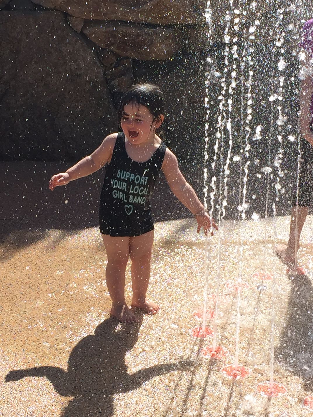 My daughter playing in the water fountain | Smithsonian Photo Contest ...