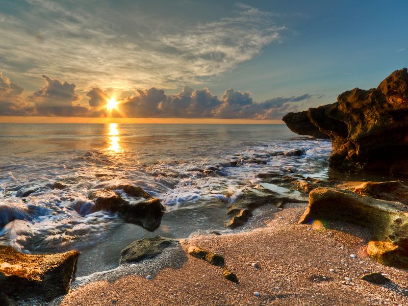 Golden Sands: Captured at sunrise on Coral Cove Beach | Smithsonian ...