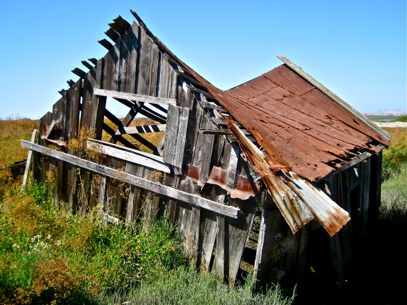 A decaying shack in the ghost town of Drawbridge, California ...