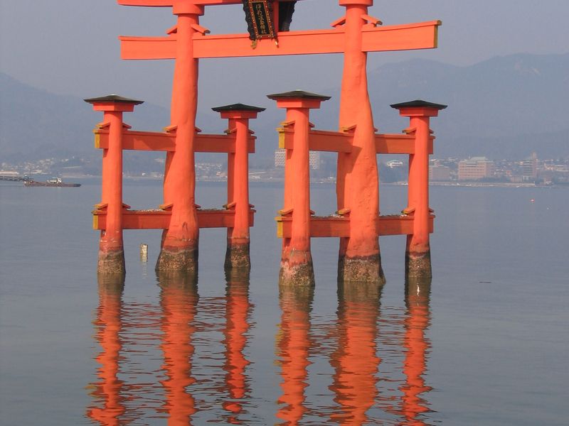 Torii of Itsukushima The Torii, or Gateway, at Miyajima Island is a ...
